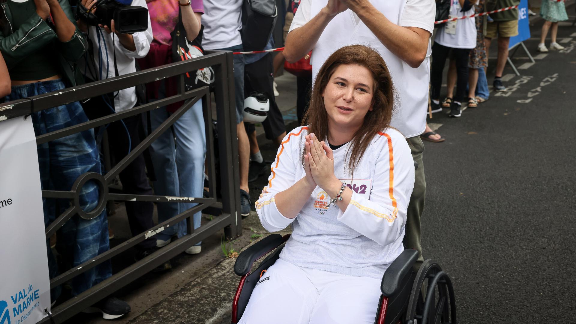 Olympic torch carried by Lebanese journalist wounded in Israeli strike ...