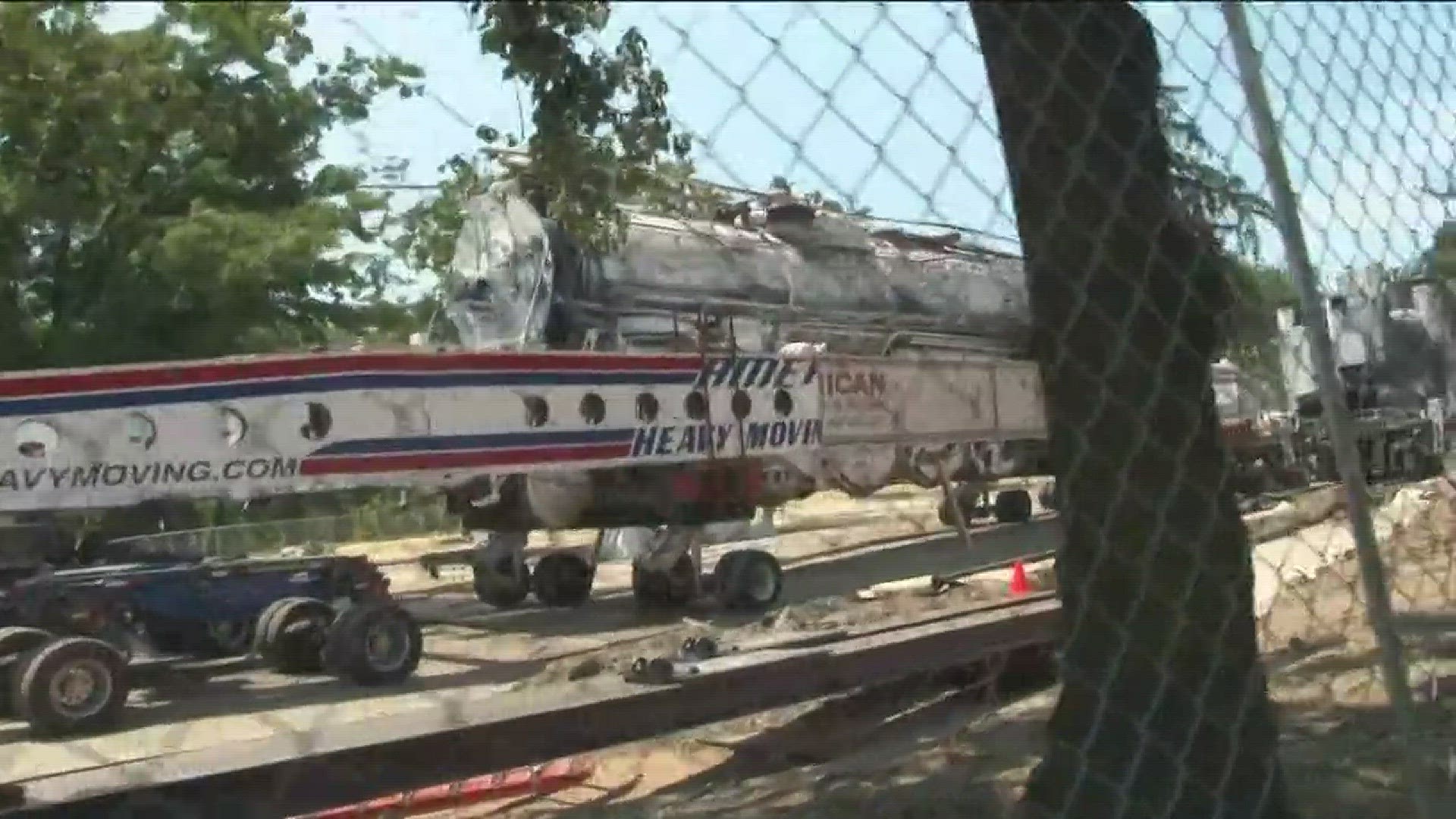 Two iconic Modesto train cars moving from park, dog park to go in it's ...