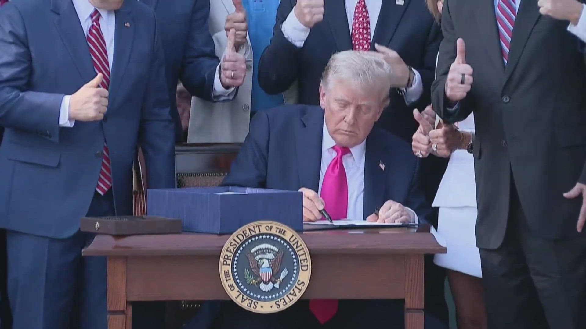 Trump signs his tax and spending cut bill at the White House July 4 ...
