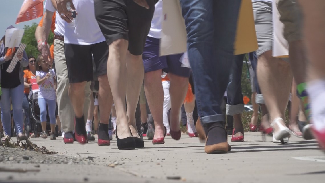 Why hundreds of people participated in 'Walk a Mile in Her Shoes' in ...