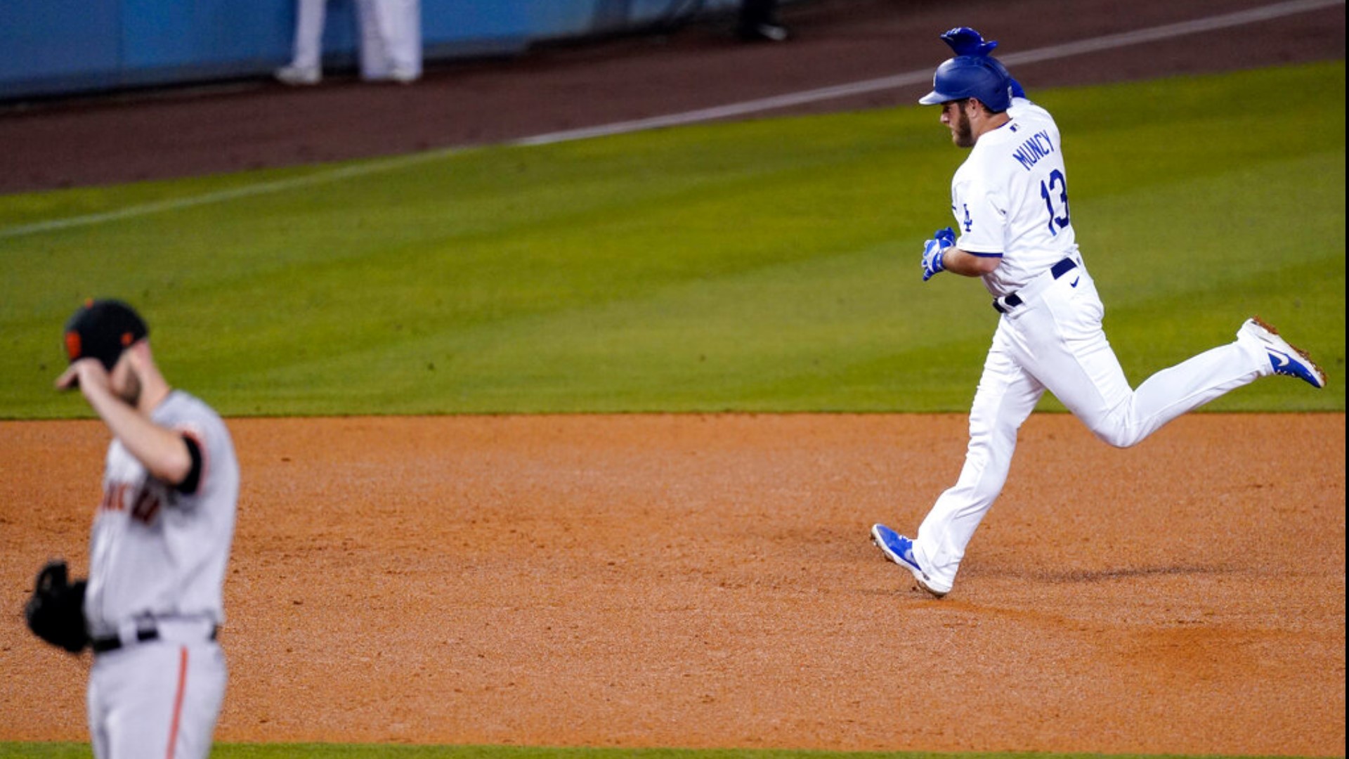 Dodgers outlast rival Giants 4-3 in homer-filled contest | abc10.com