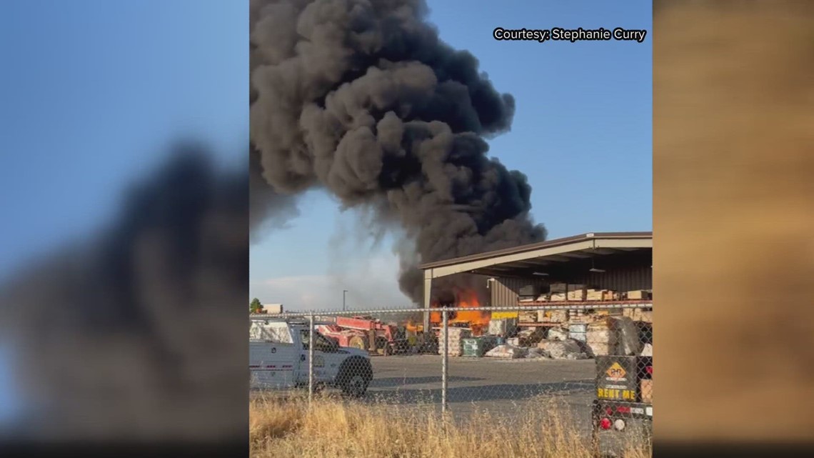 Fire spreads into storage containers with 'hazardous materials' in ...