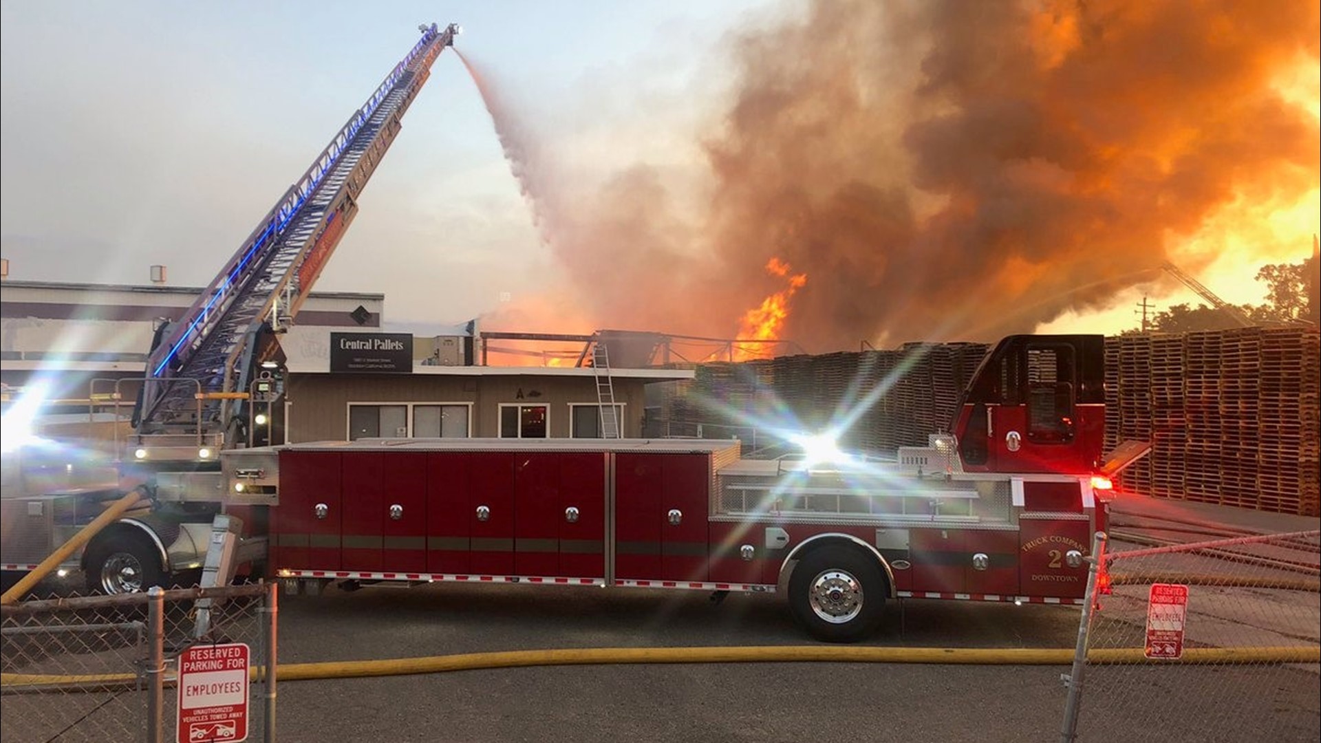 Massive fire at Stockton pallet yard, warehouse contained, officials ...