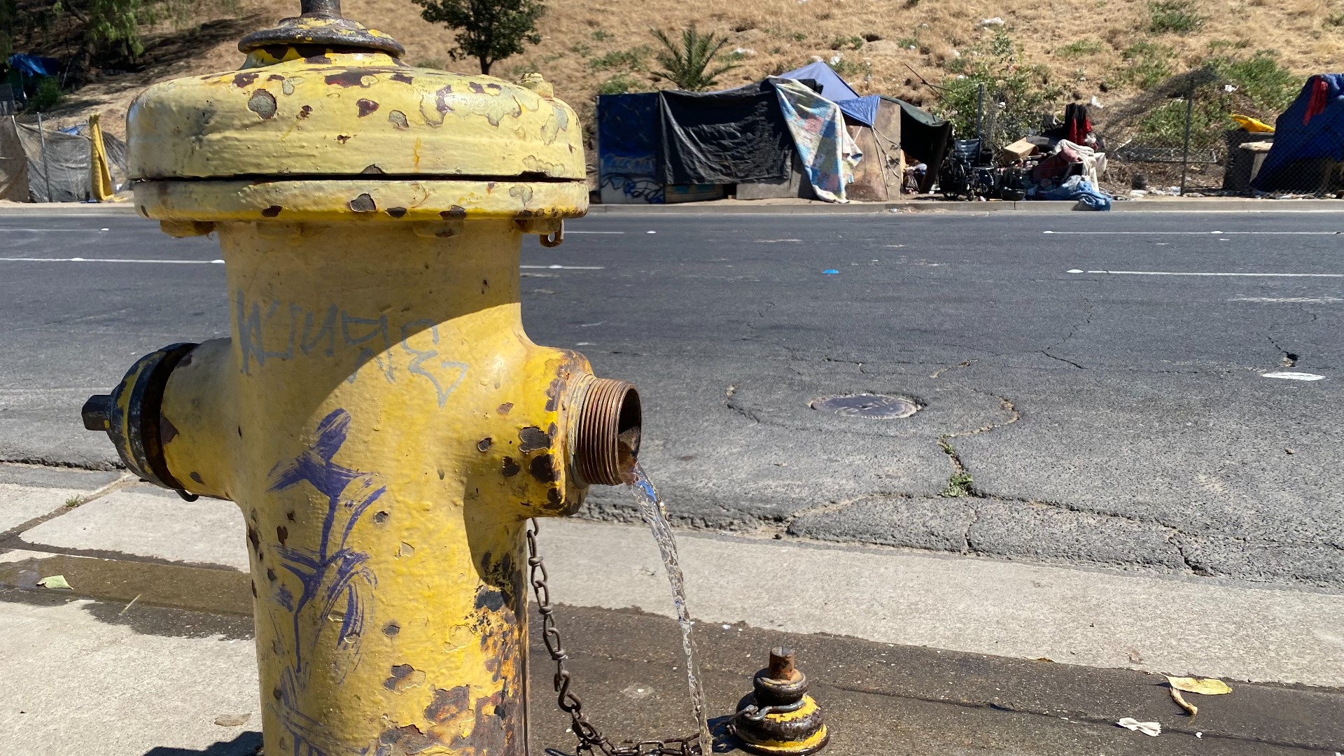 Stockton homeless tap into fire hydrants amid hot temps | abc10.com