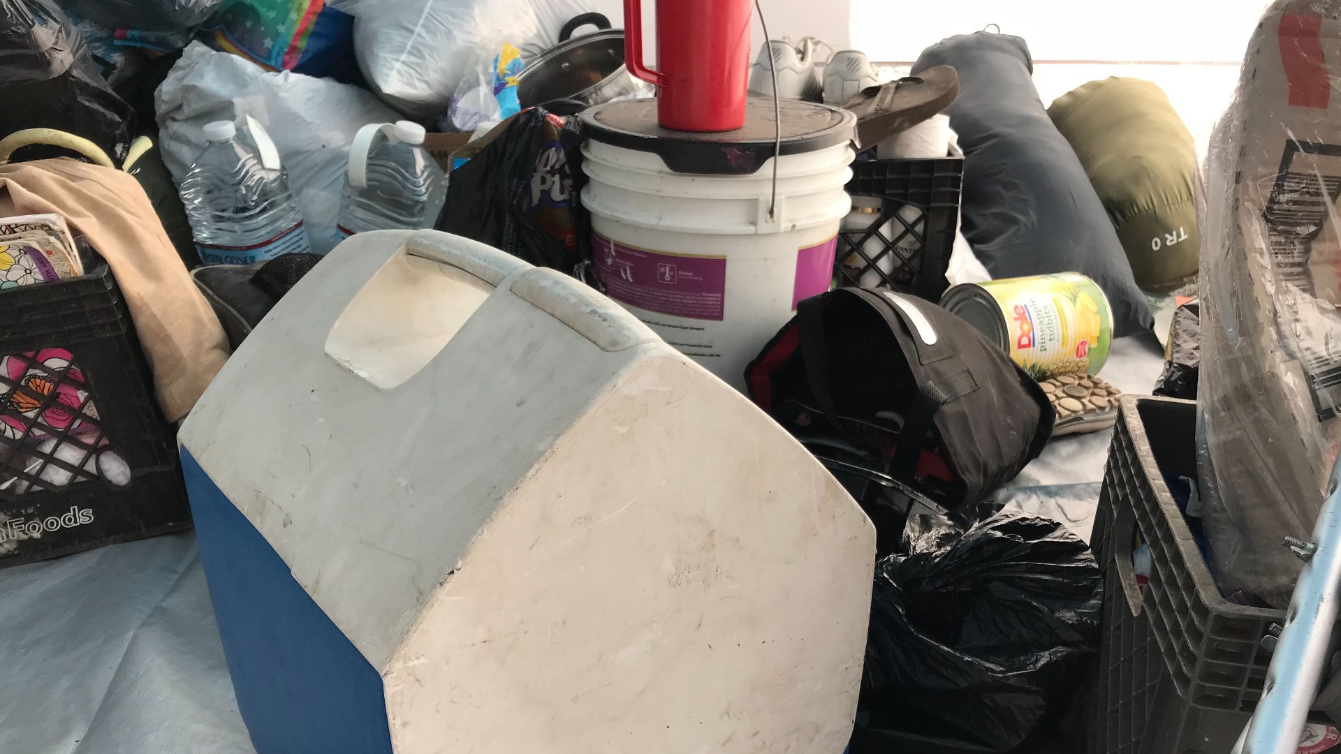 Modesto homeless move into new tent city under 9th Street bridge ...