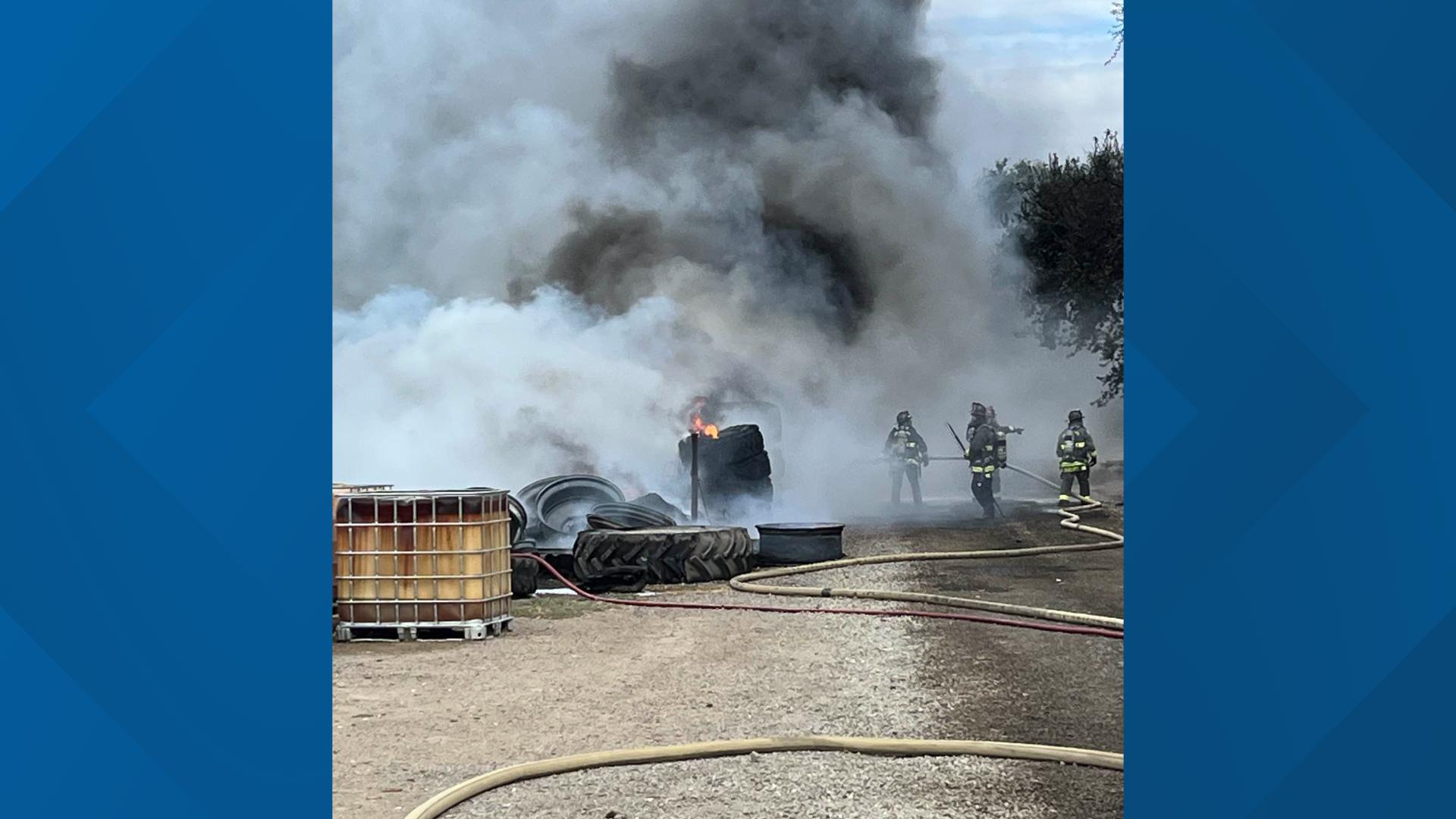 Tracy tire fire causes big smoke column, burns equipment | abc10.com