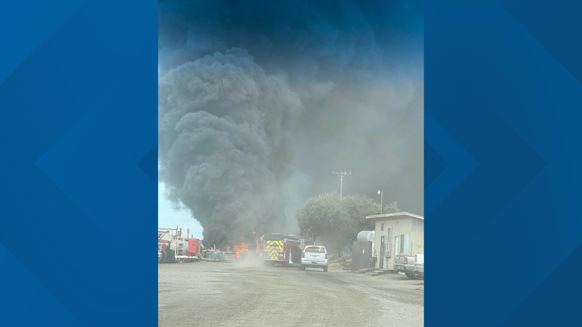 Tracy tire fire causes big smoke column, burns equipment | abc10.com