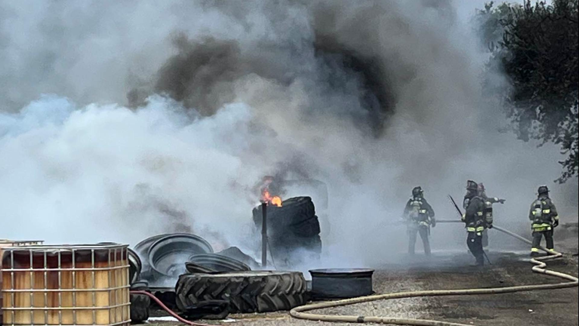 Tracy tire fire causes big smoke column, burns equipment | abc10.com