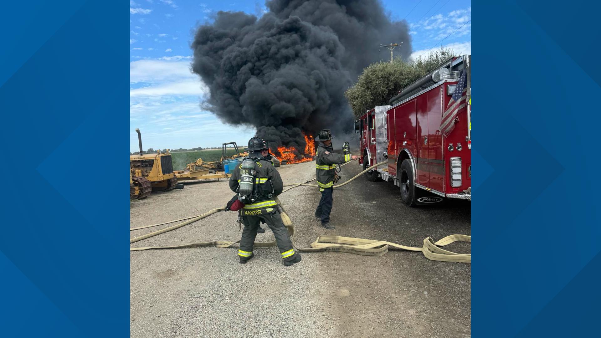 Tracy tire fire causes big smoke column, burns equipment | abc10.com