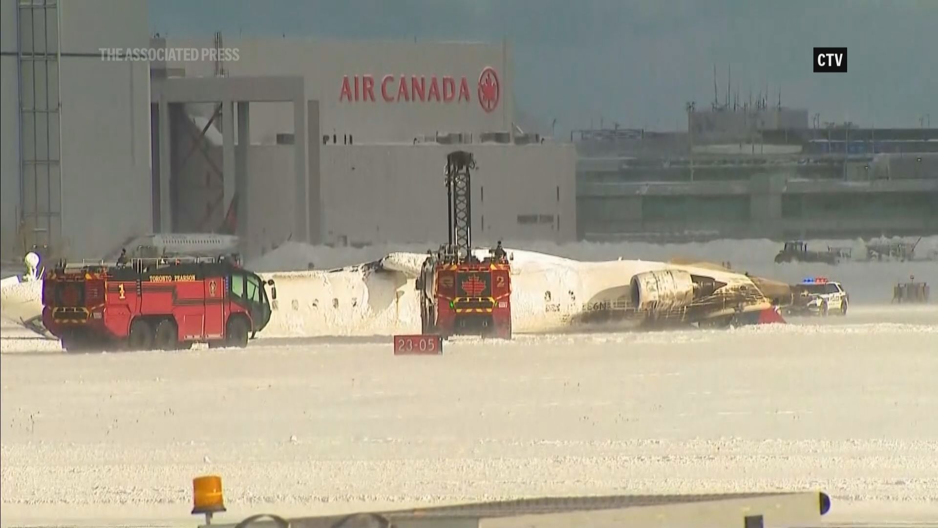Delta flight crashes at Toronto Airport after landing, flips upside ...